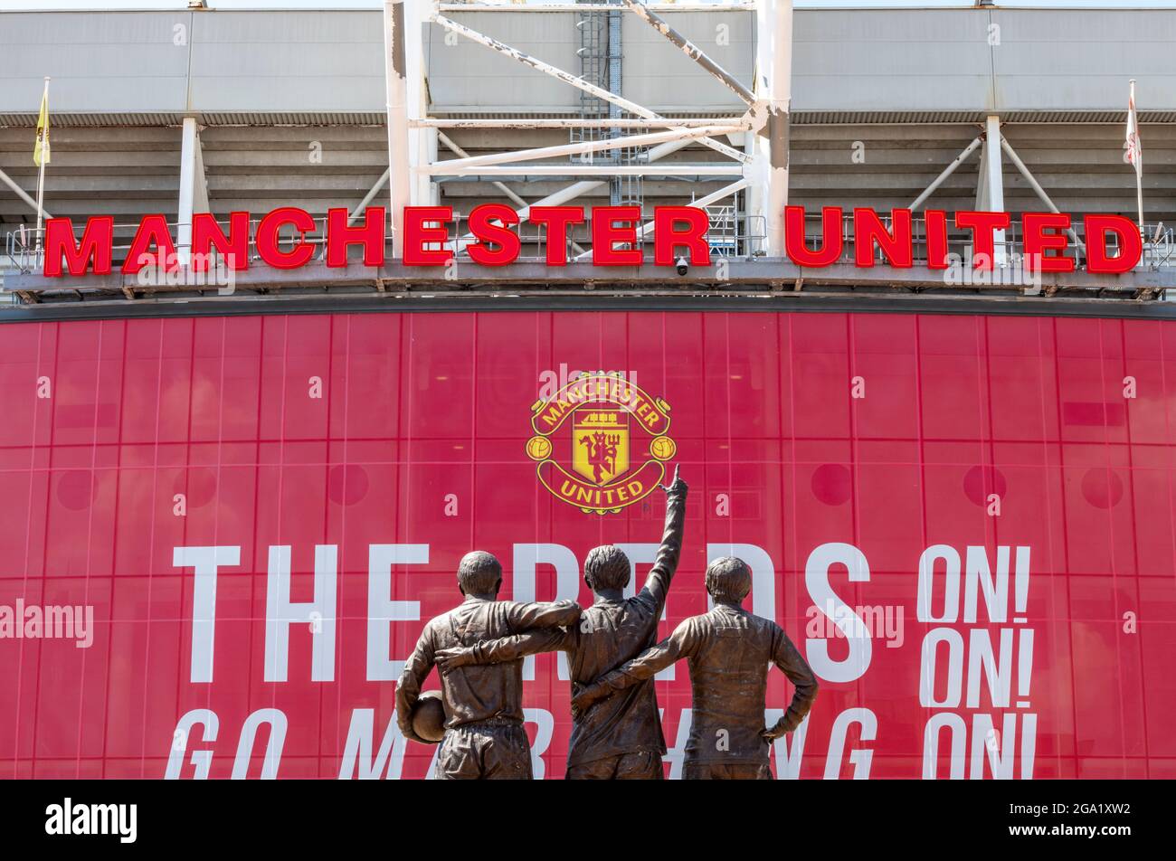 the manchester united trinity statue outside of old trafford football ...