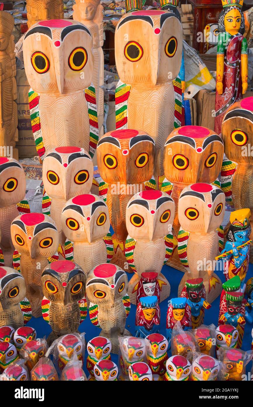 Wooden owls, artworks of handicraft, on display during Handicraft Fair ...