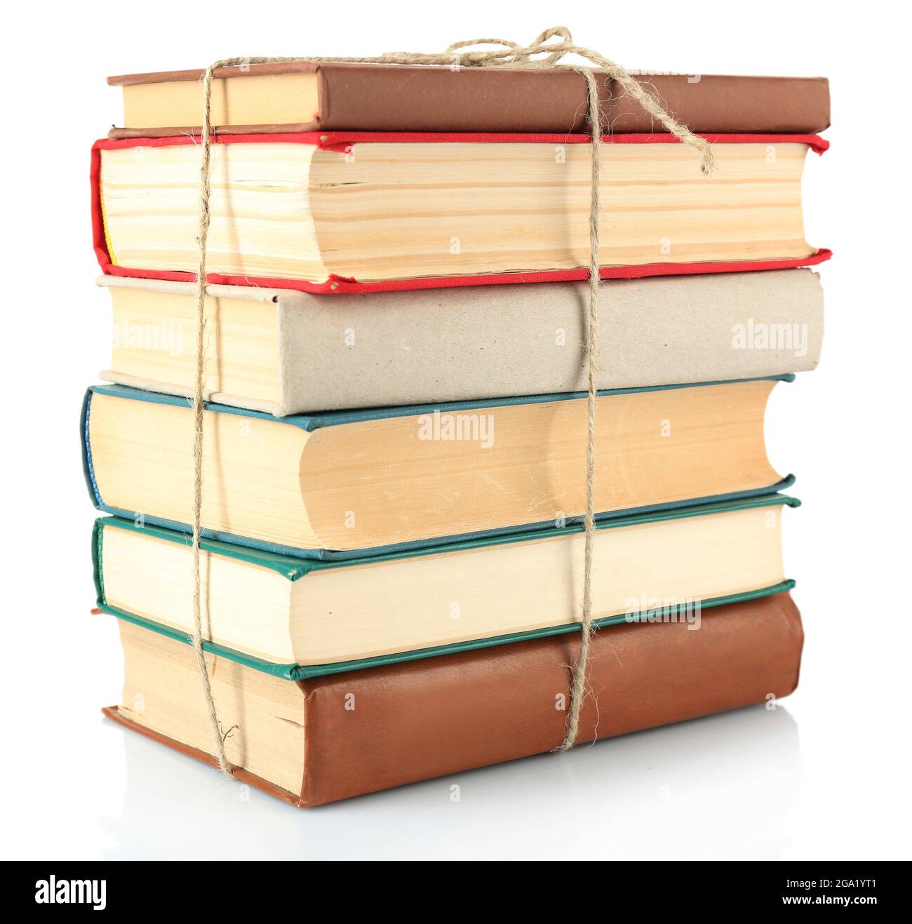 Stack of dusty books on white background hi-res stock photography and ...