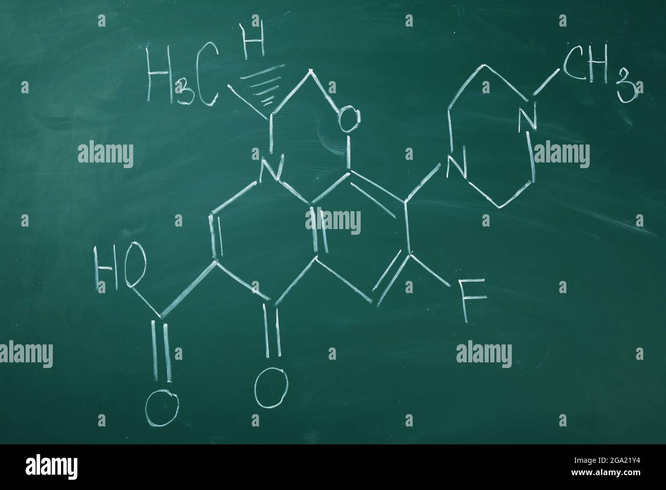Molecule models and formulas on blackboard background Stock Photo - Alamy