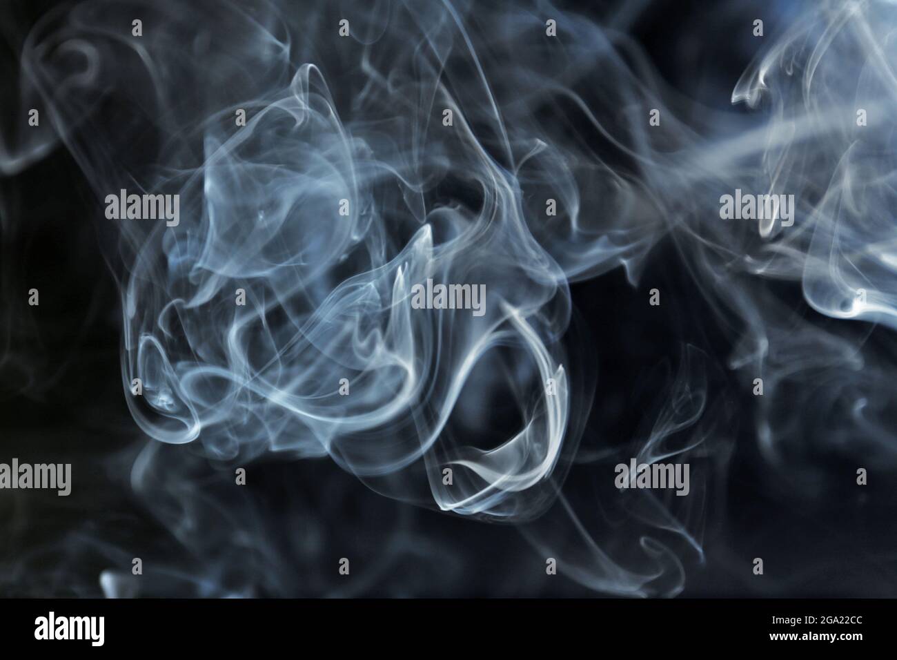 Color smoke from match on dark background Stock Photo - Alamy