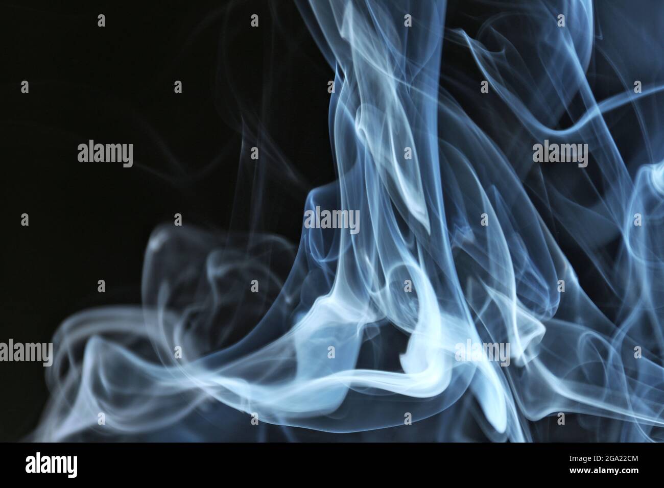 Color smoke from match on dark background Stock Photo - Alamy