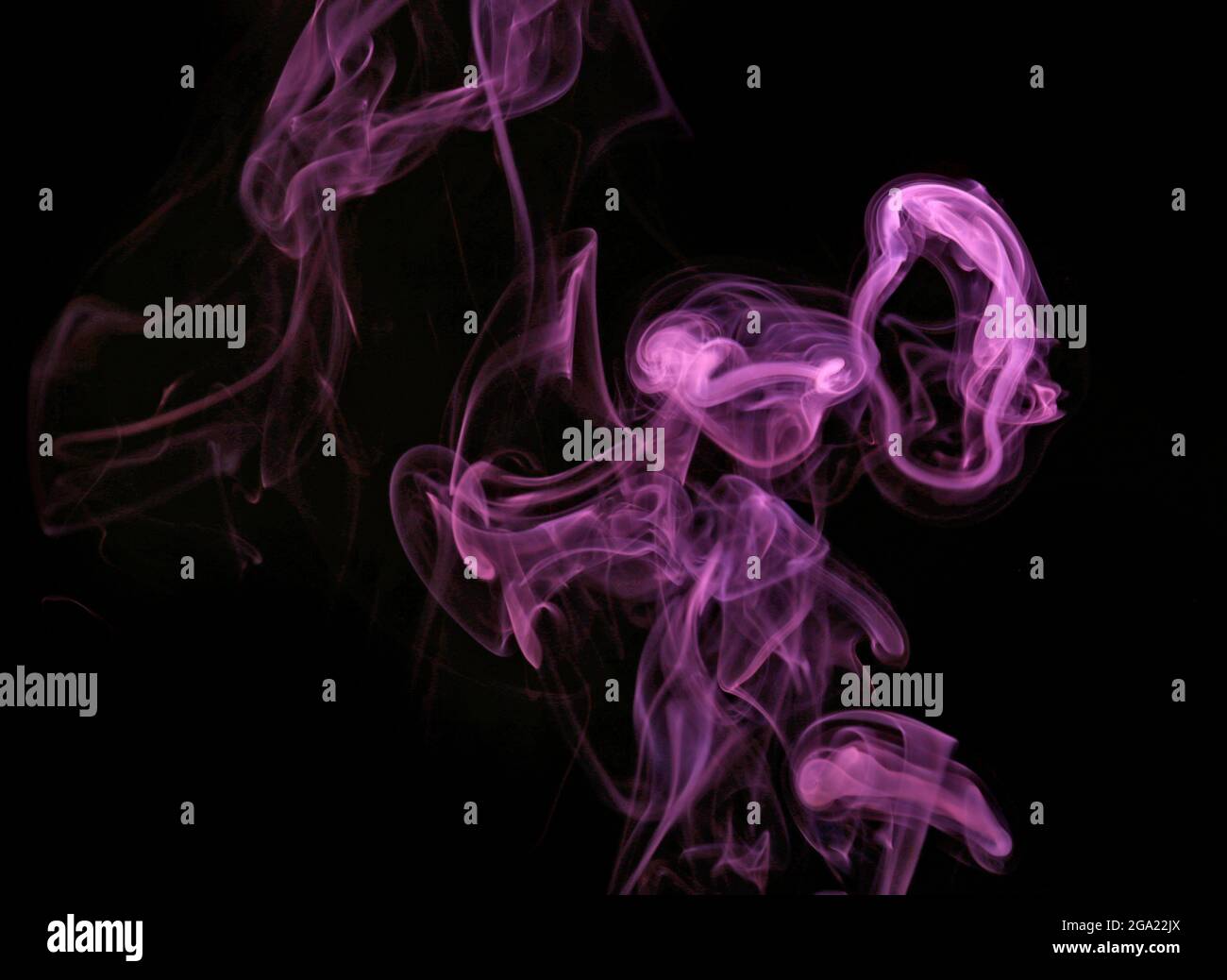 Color smoke from match on dark background Stock Photo - Alamy