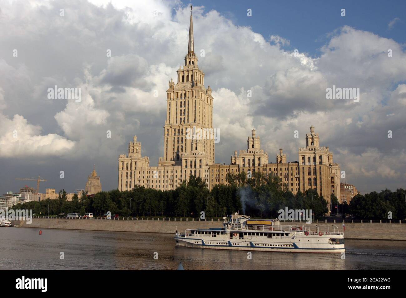 Stalin skyscraper Hotel Ukraine an sunset on blu sky with clouds at ...