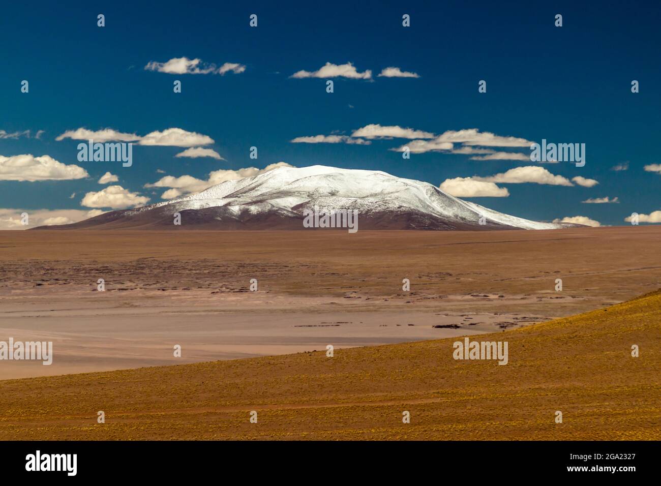 Snow covered peak at bolivian Altiplano Stock Photo - Alamy