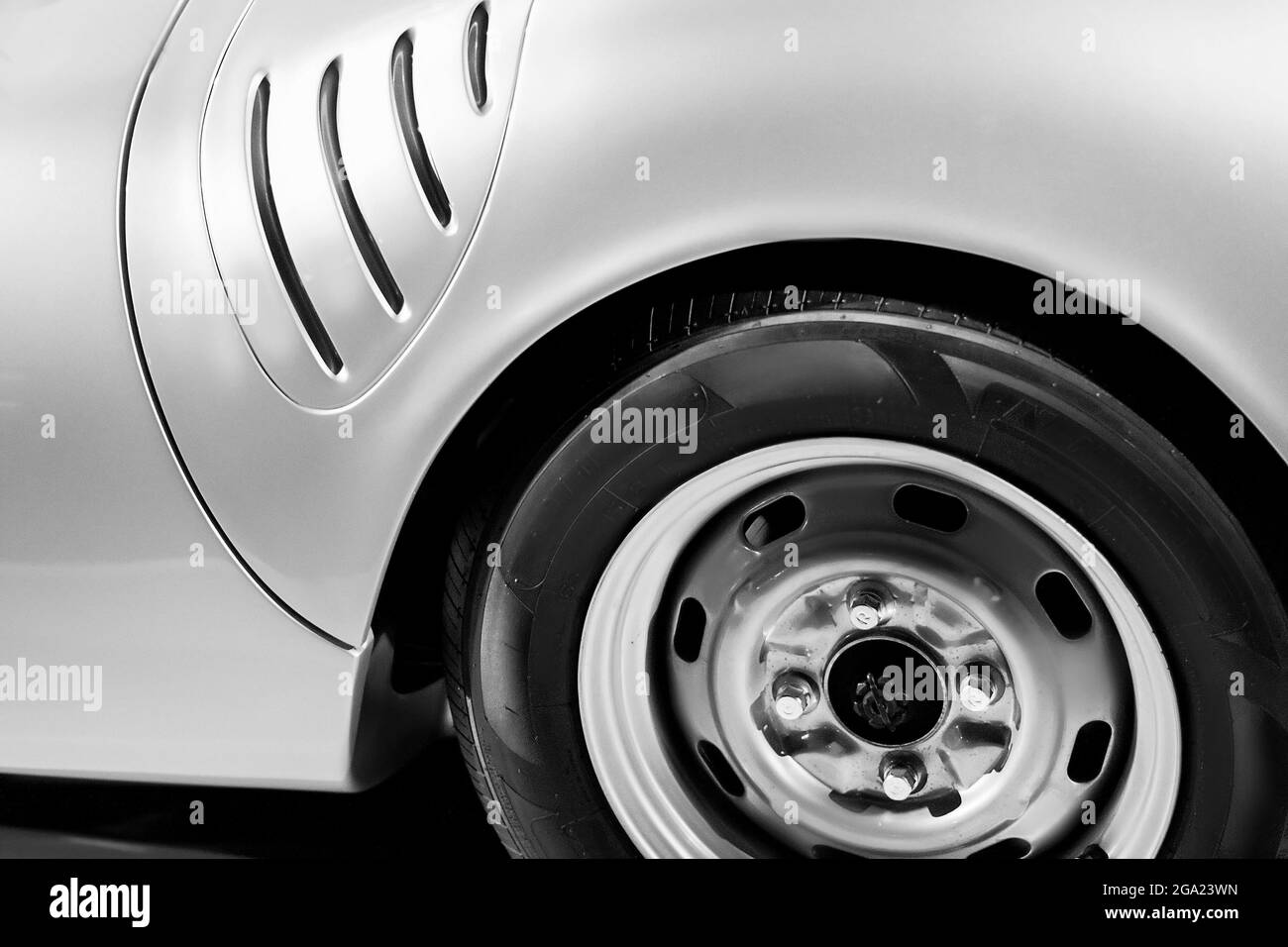 Rear fender of luxury vintage car. Old car classic design. Black and ...