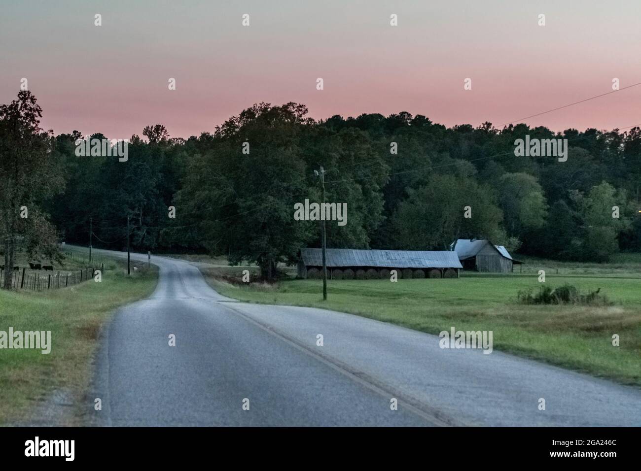 View down an empty country road in rural Alabama at twilight Stock ...