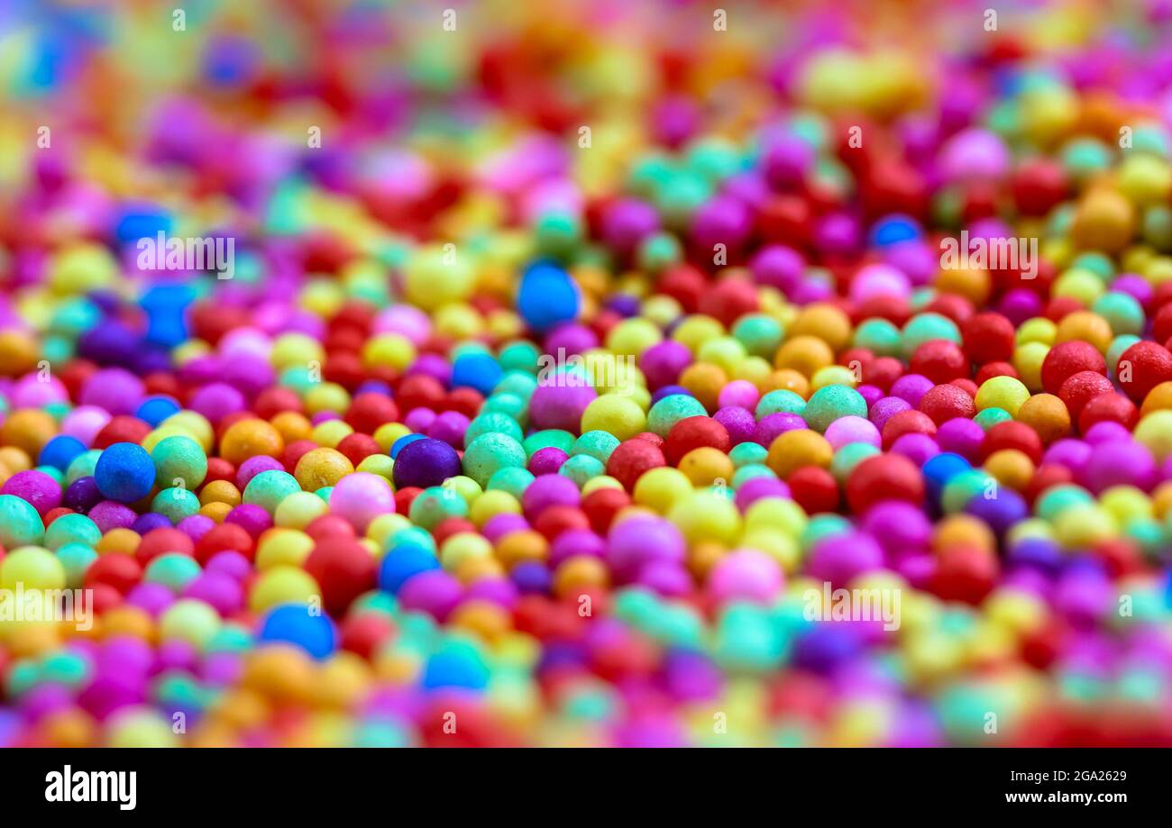 Many colorful foam balls. Round multi-color confetti backdrop ...