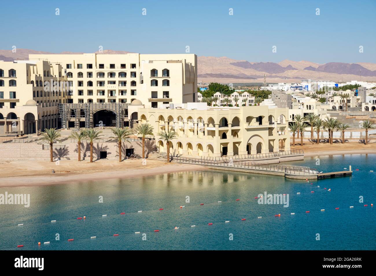 Private lagoon shared by Qaser Al-Aqaba hotel under construction and Al ...