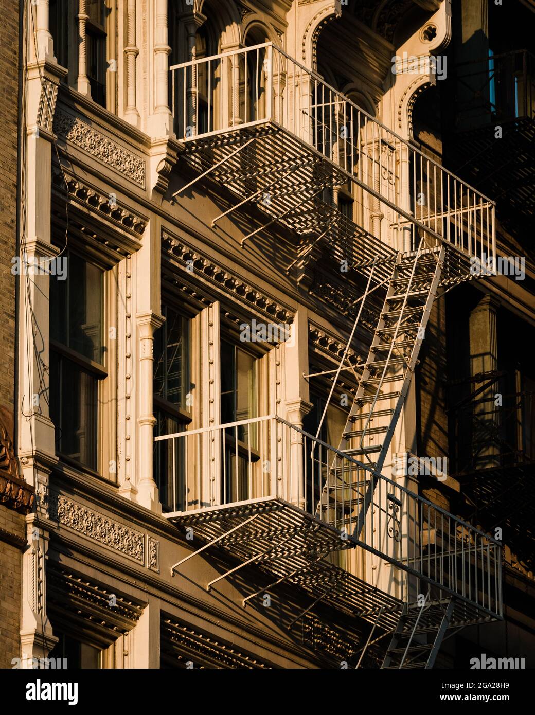 Architectural details and fire escapes in Soho, Manhattan, New York ...