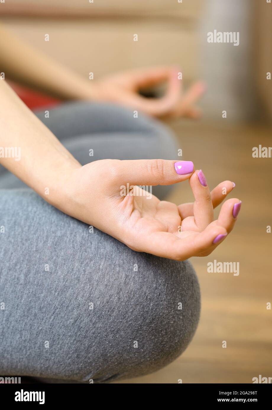 Hand yoga gesture on bright background Stock Photo - Alamy