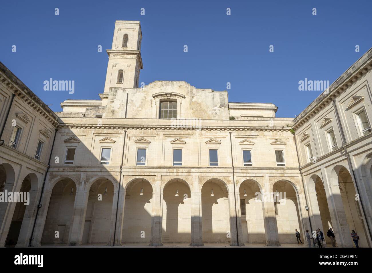 Arches and tower in the historic city square of Lecce, Southern Italy ...