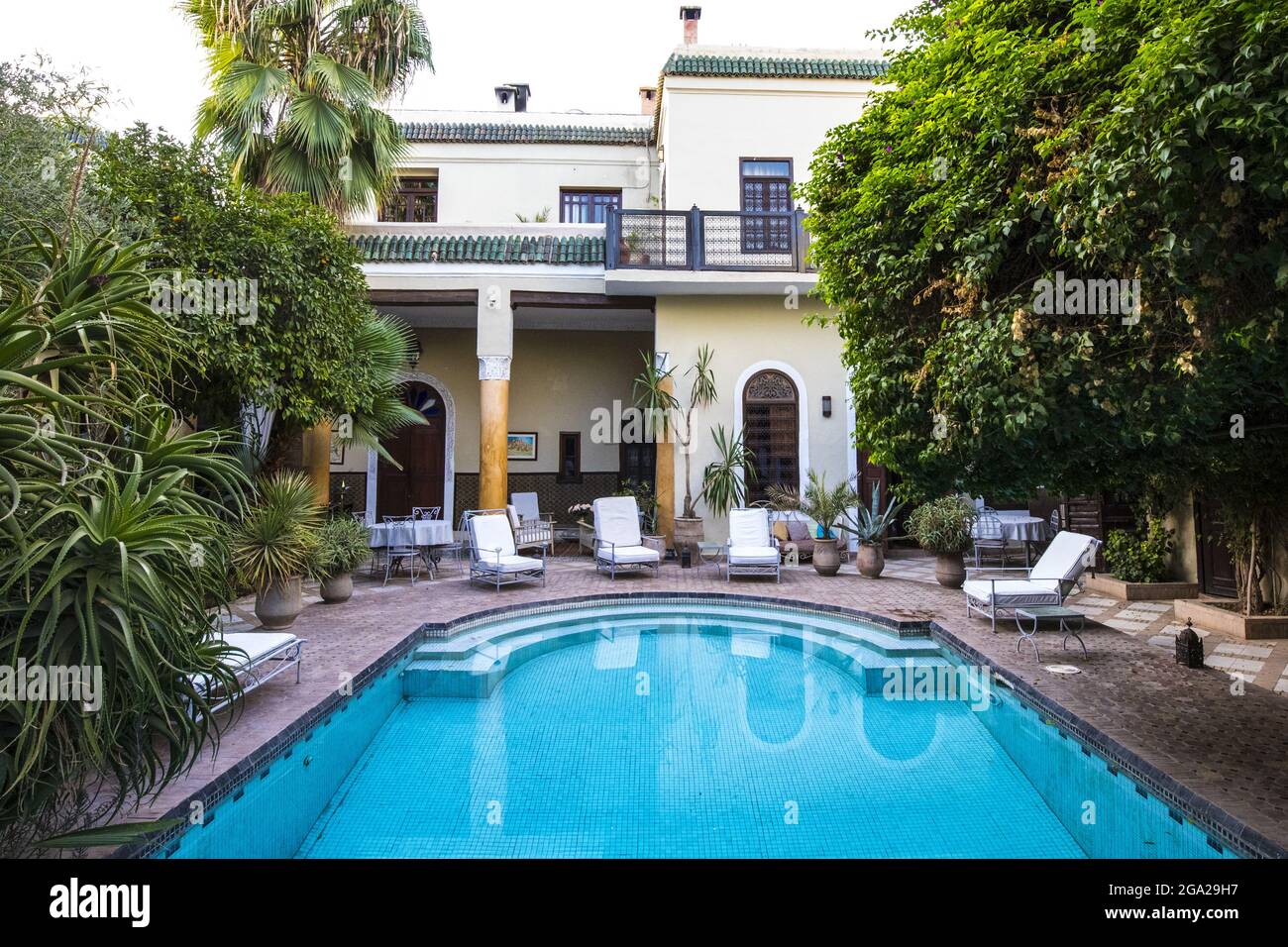 Swimming pool in the courtyard of the Palais Arrsat in the Medina of ...