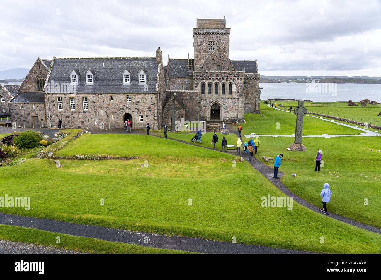 Visitors explore the grounds of the former Benedictine Abbey on Isle of ...