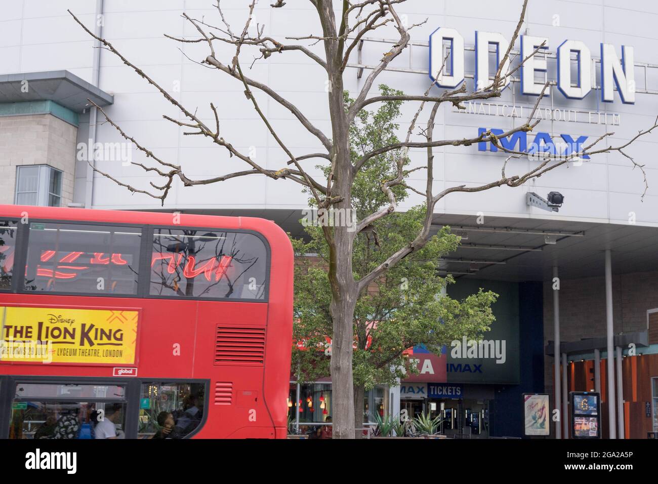 the Lion King ad on London red bus outside IMAX Odeon cinema London ...