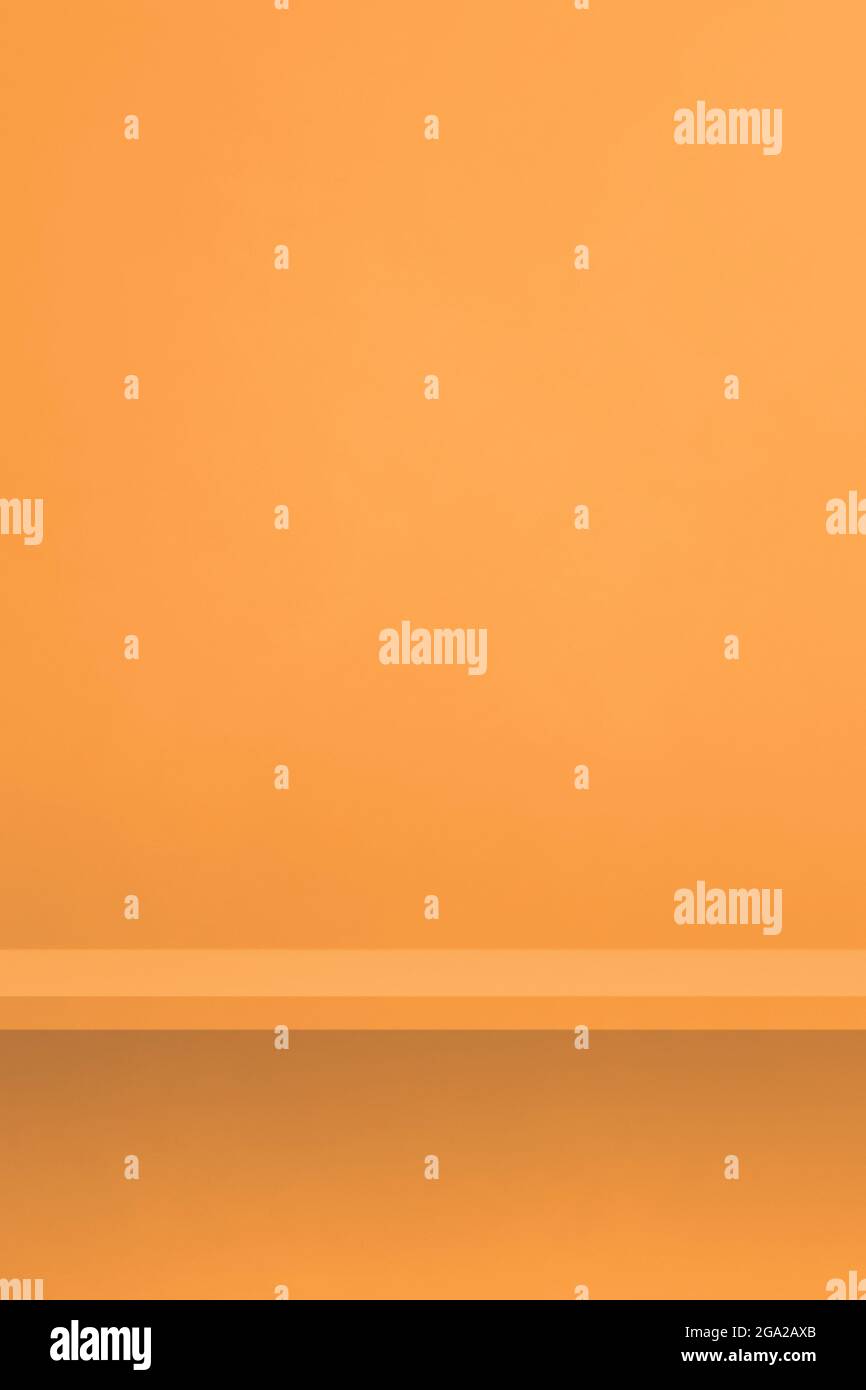Empty shelf on light orange wall. Background template scene. Vertical ...