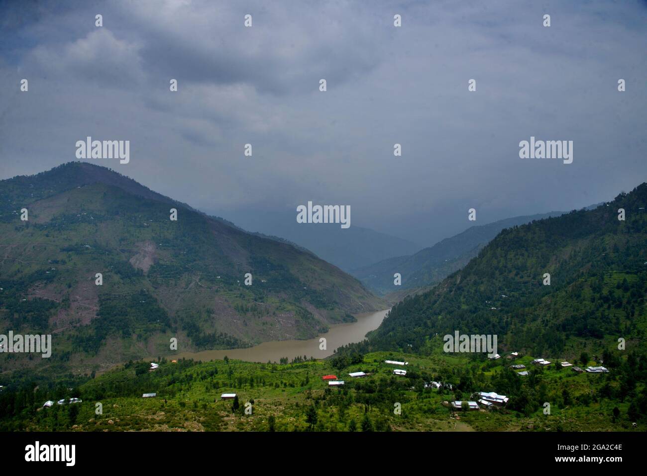 A beautiful view of mountains houses along the Neelam River have huge ...