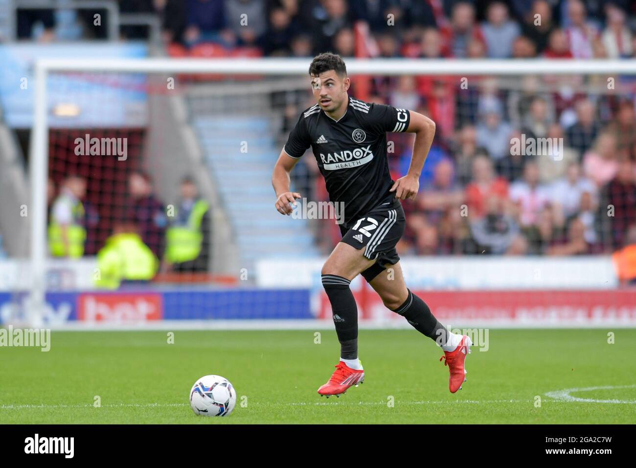 John Egan #12 of Sheffield United runs forward with the ball Stock ...