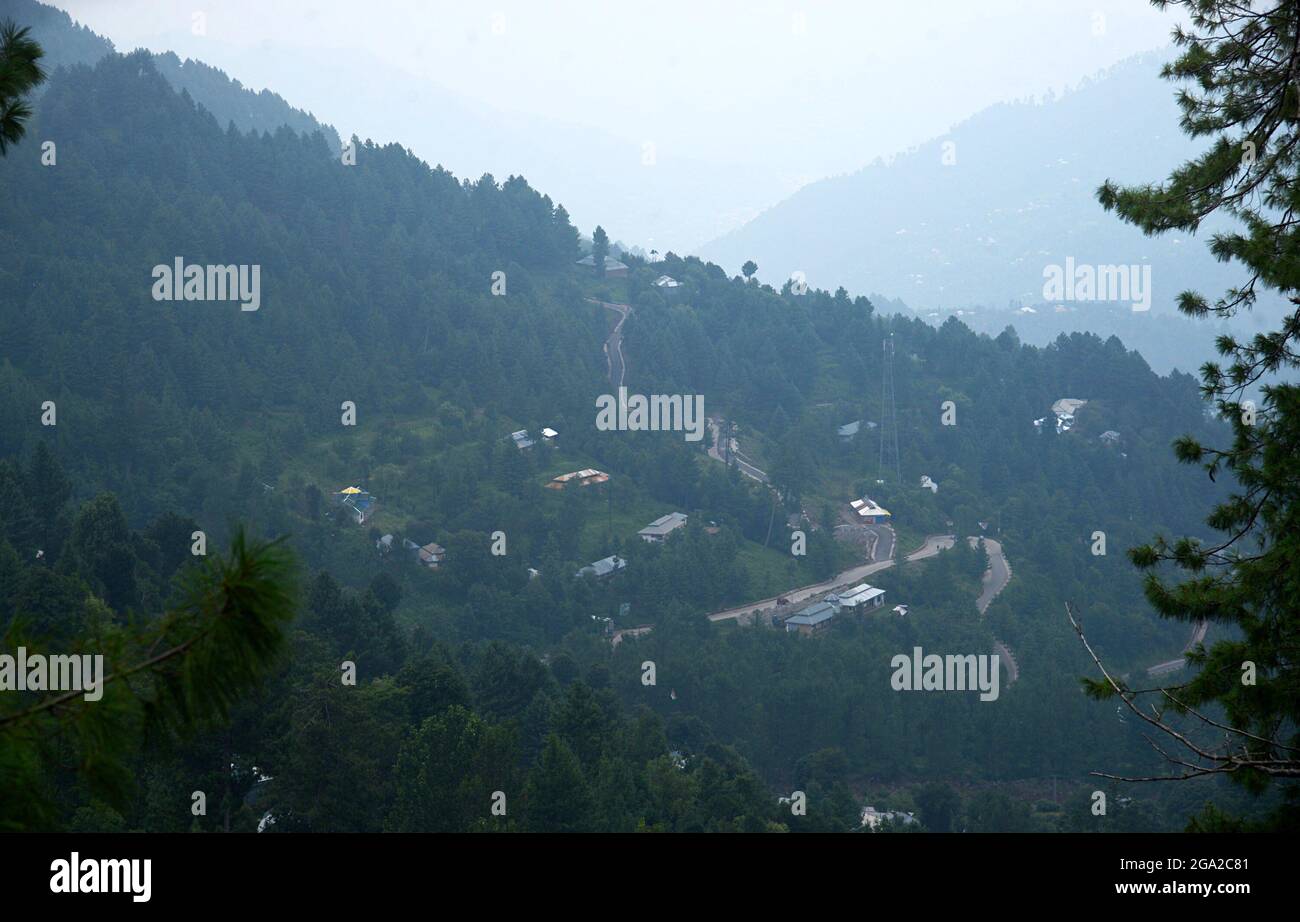 A beautiful view of mountains houses along the Neelam River have huge ...