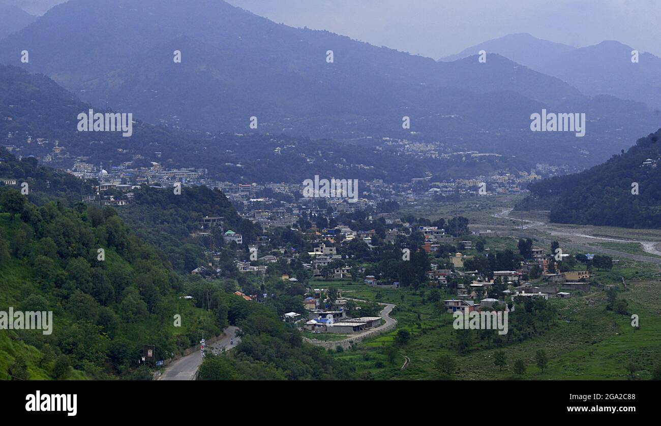 A beautiful view of mountains houses along the Neelam River have huge ...