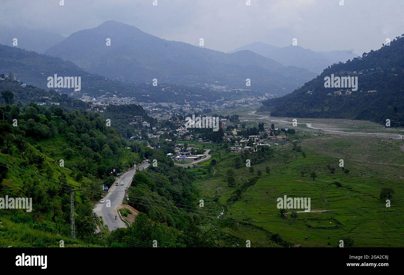 A beautiful view of mountains houses along the Neelam River have huge ...