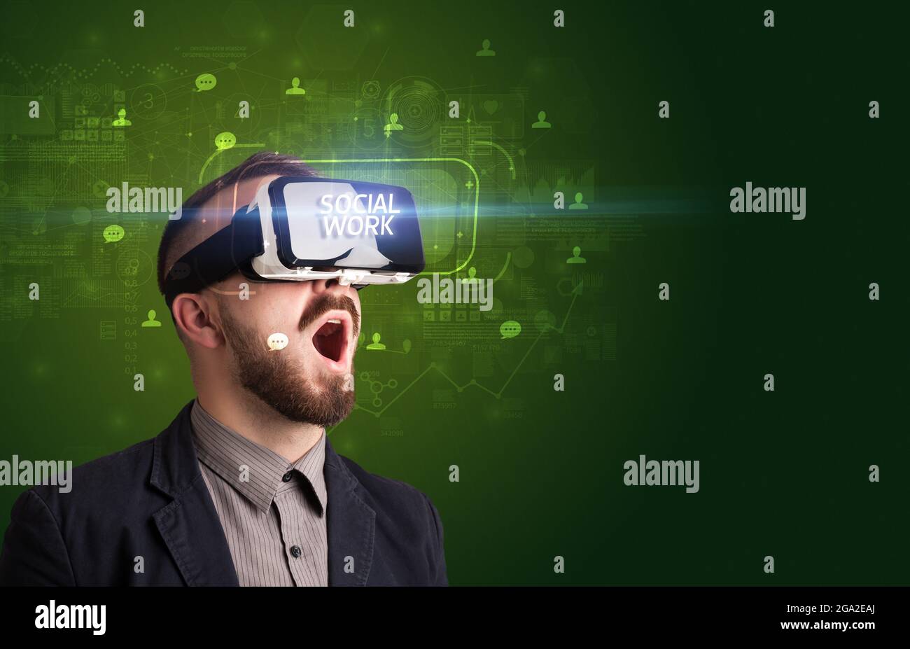Businessman looking through Virtual Reality glasses, social media ...
