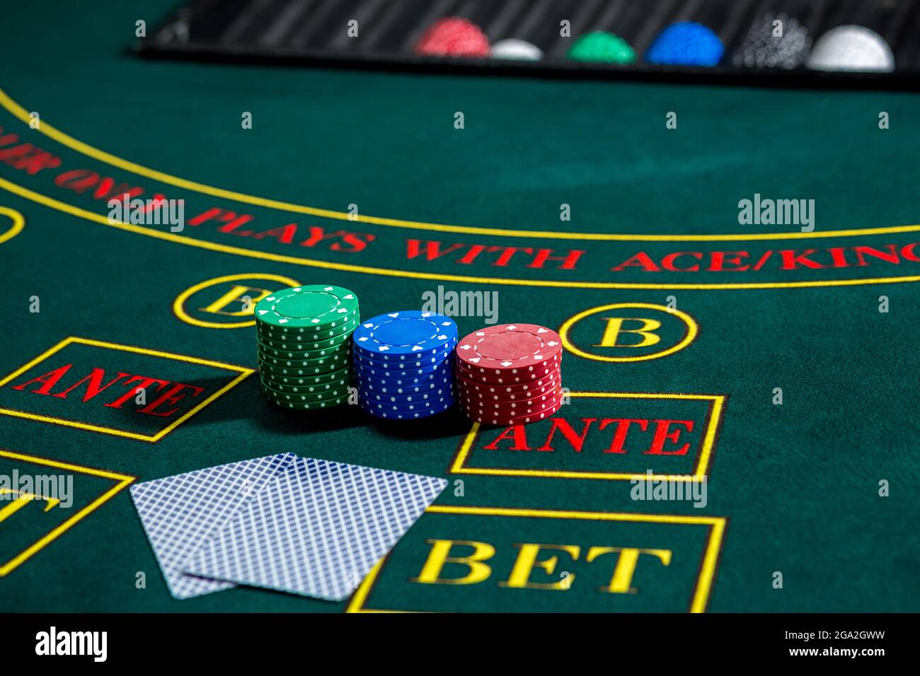 Poker play. Chips and cards Stock Photo - Alamy