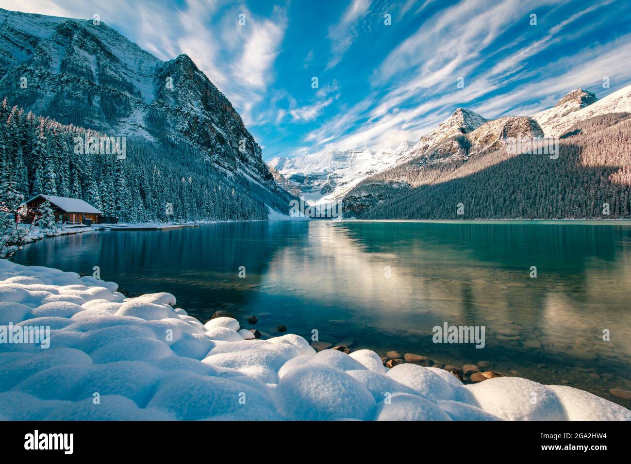 Lake Louise with snow in autumn, Banff National Park; Alberta, Canada ...