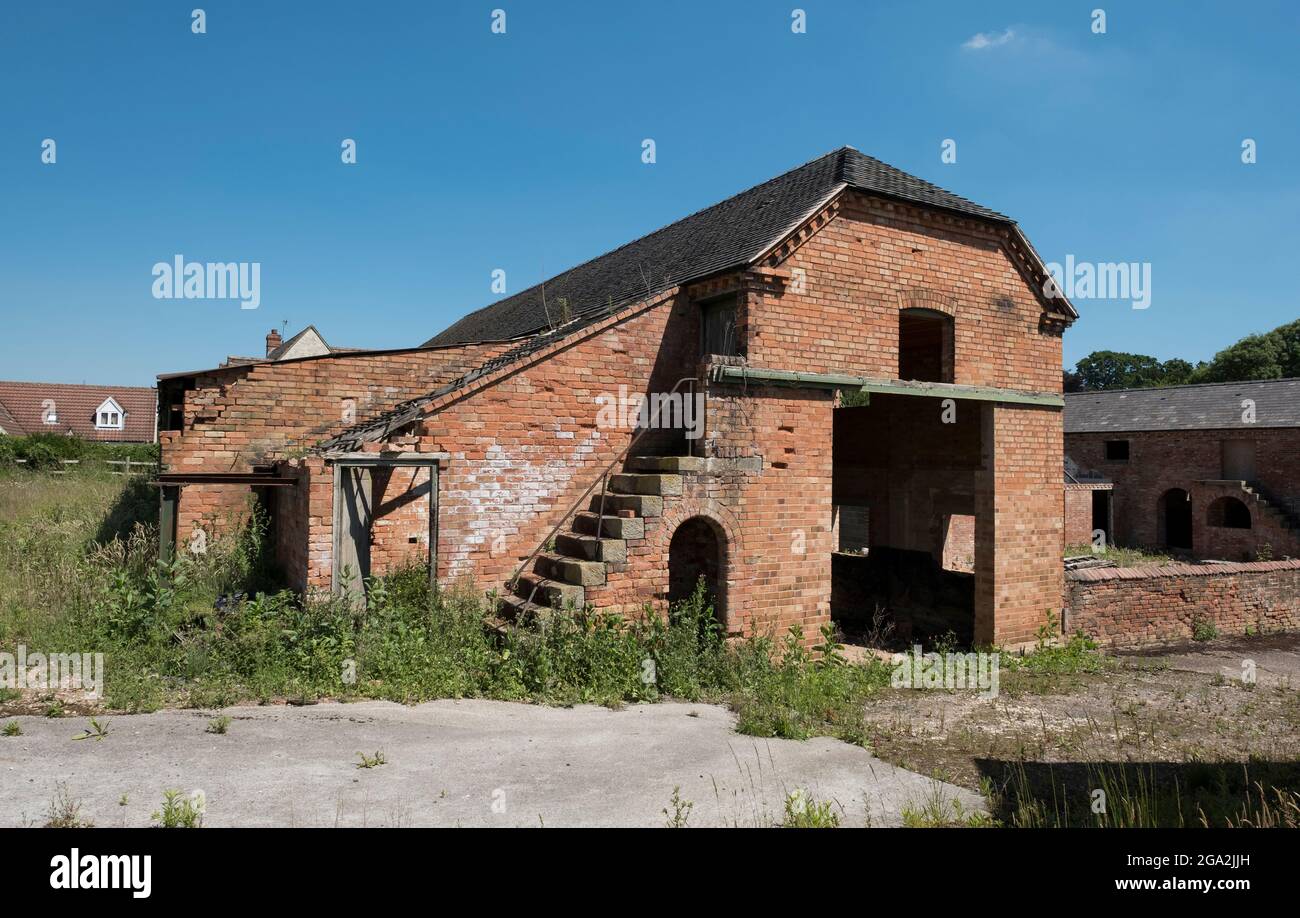 Old brick farm building ready for renovation Stock Photo - Alamy
