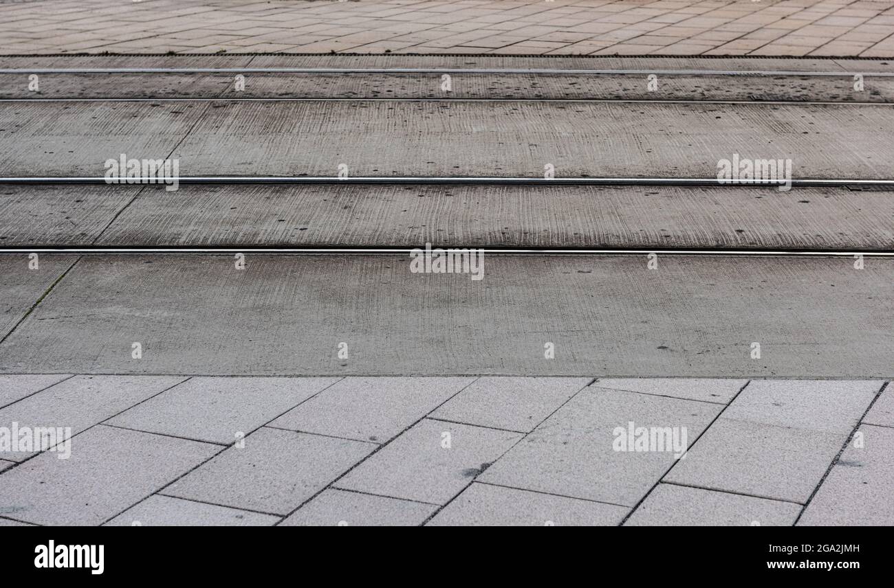 Tram tracks on concrete floor Stock Photo - Alamy