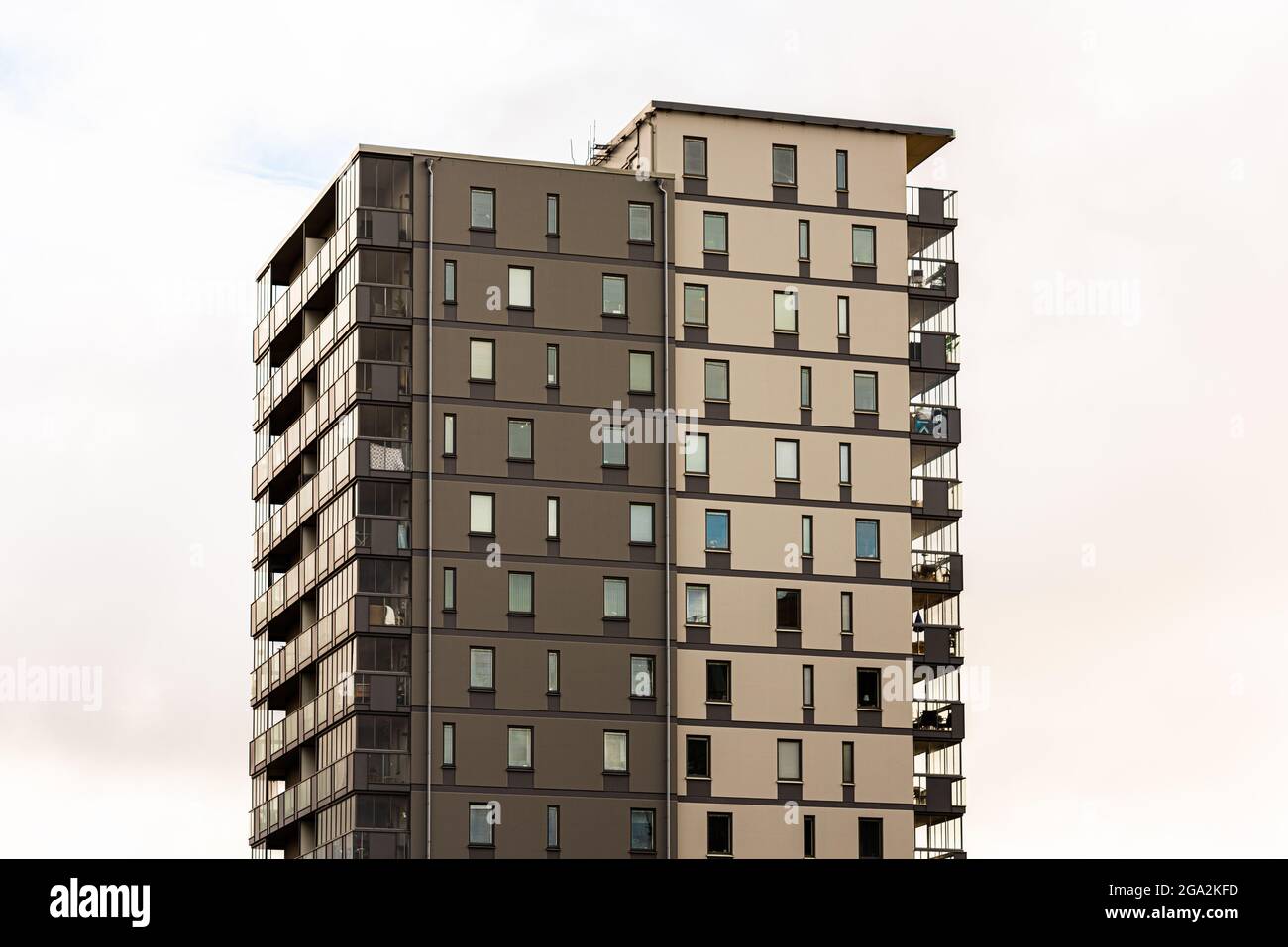 Ten storey high grey apartment building Stock Photo - Alamy