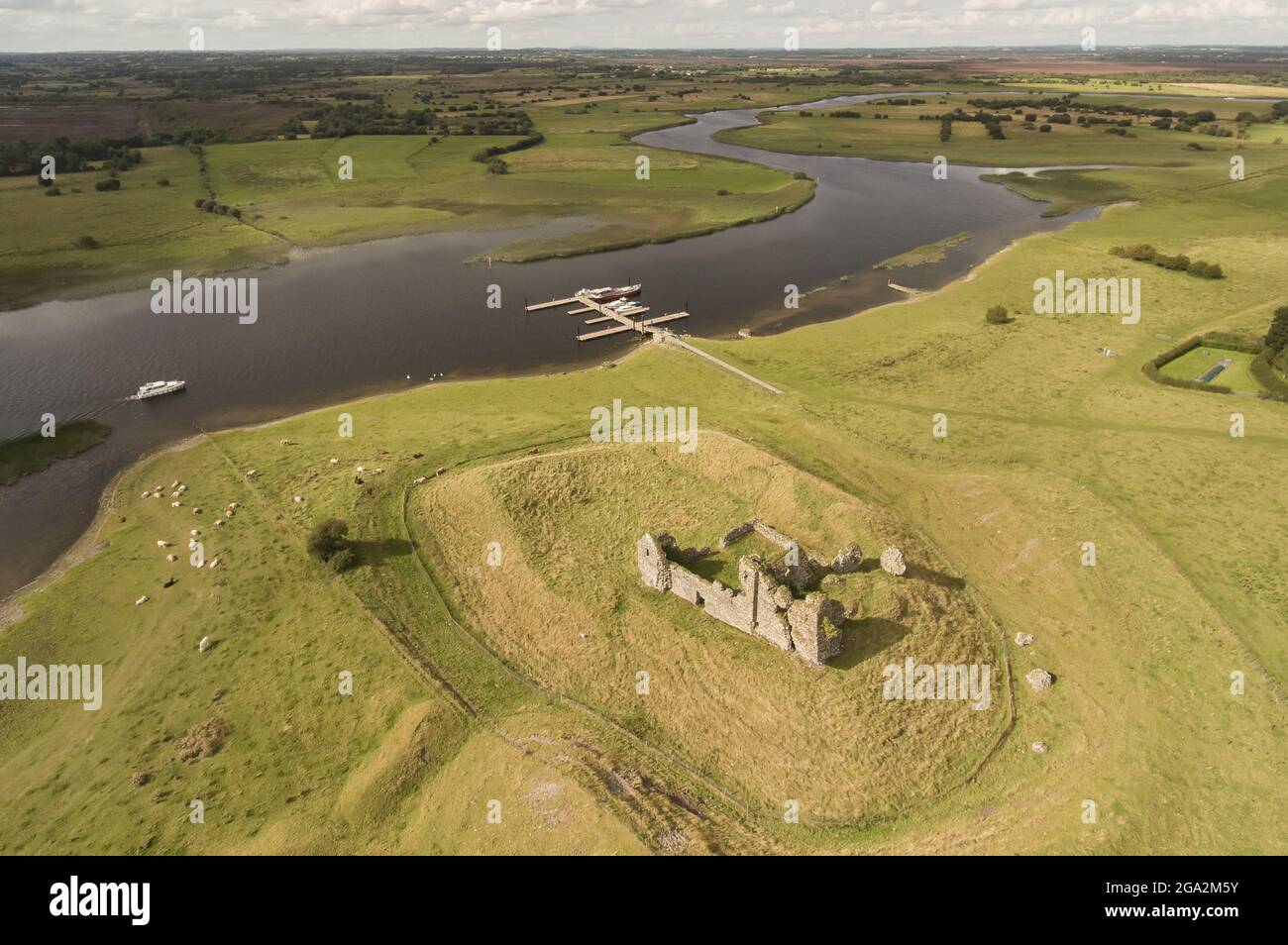 Aerial view of the Clonmacnoise Castle ruins situated on a grassy motte ...