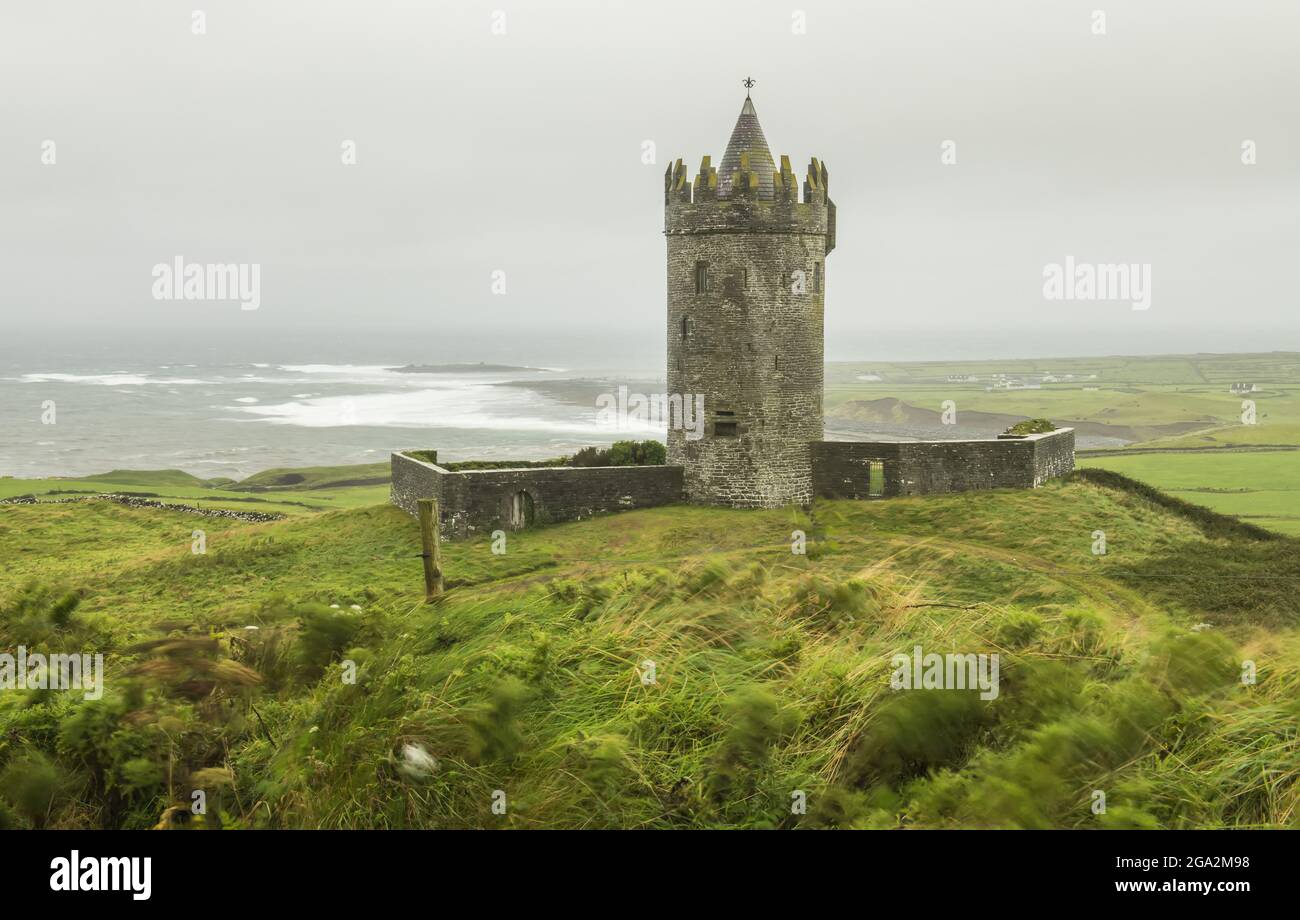 Doonagore Castle near the village of Doolin overlooking the seaside of ...