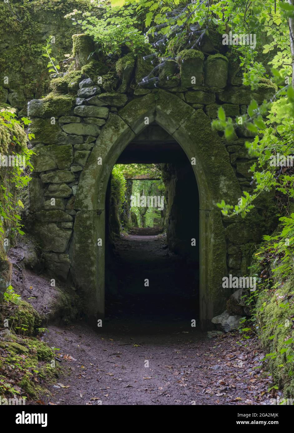 A stone archway and tunnel on the Pigeon Hole Loop nature walk in the ...