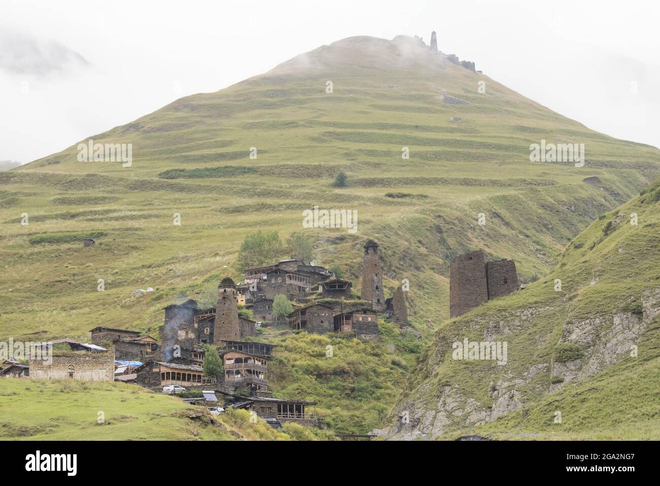 The mountainside village of Dartlo and its ruins of medieval towers ...