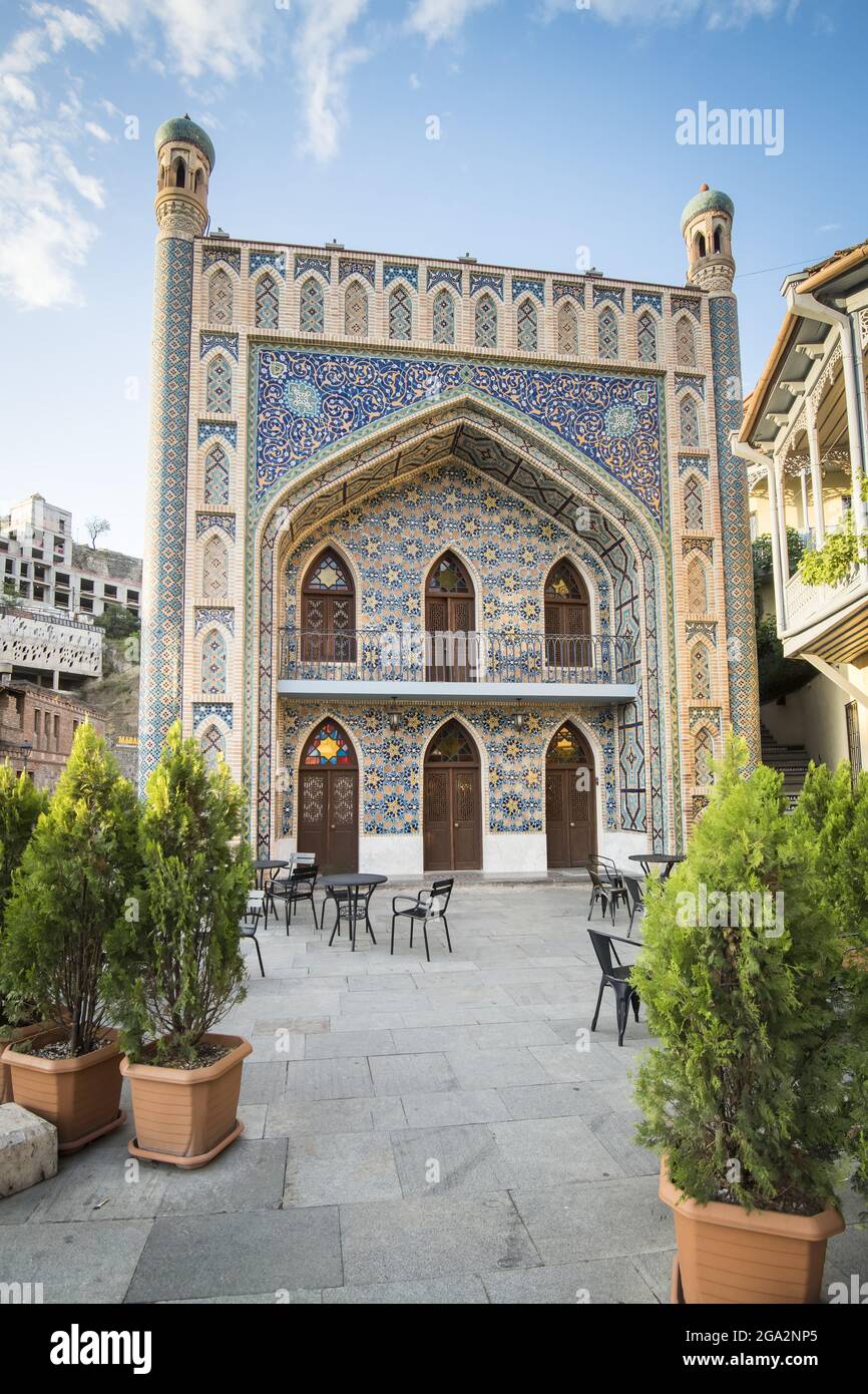 Sitting area in front of the mosaic tiled, mosque-like facade of the ...