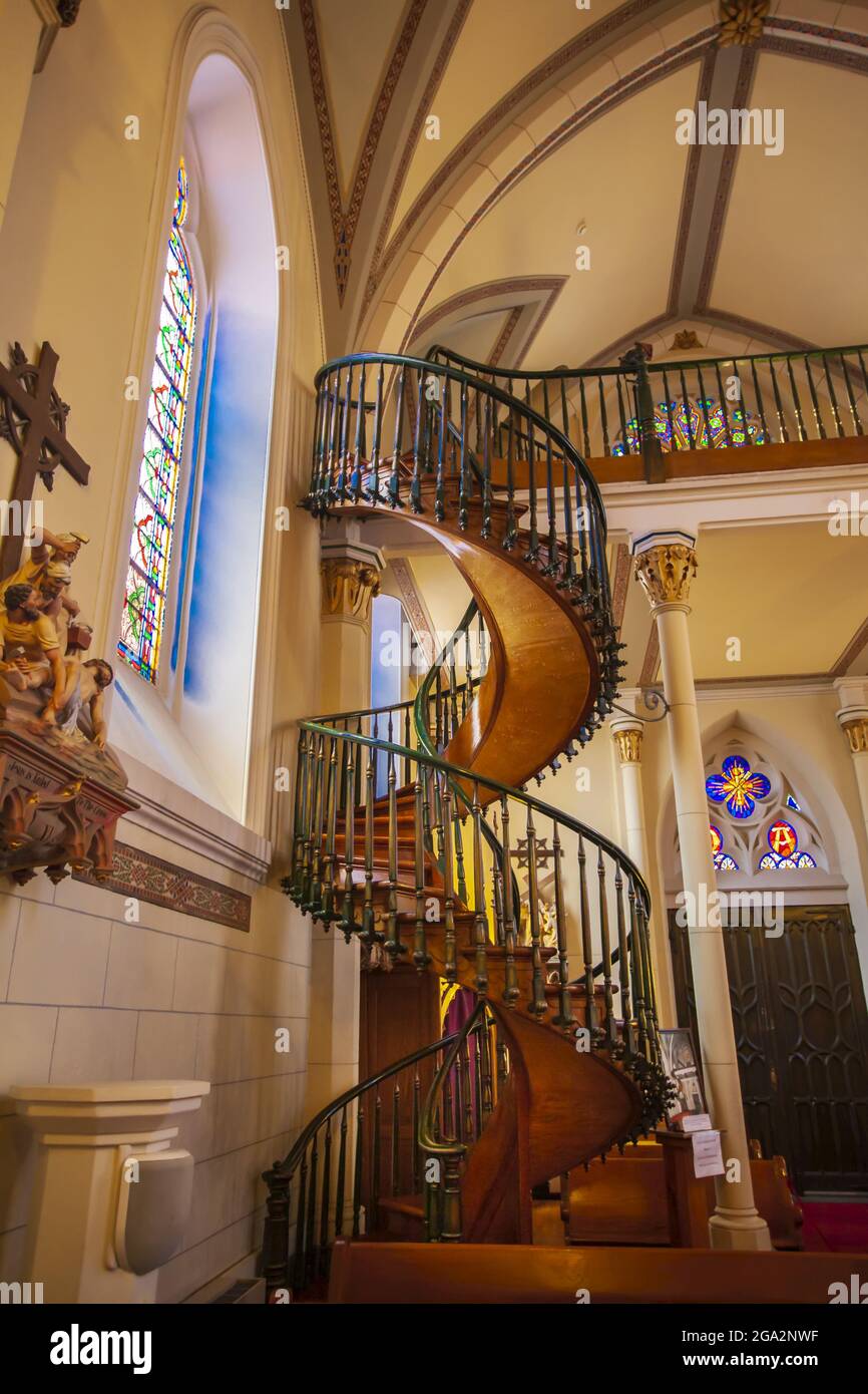 Interior of the historic Loretto Chapel with its spiraling, Miraculous ...