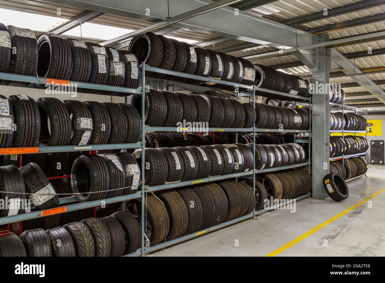 Tyre bay at Silverstone Race Circuit, Northamptonshire, UK. Racks of ...