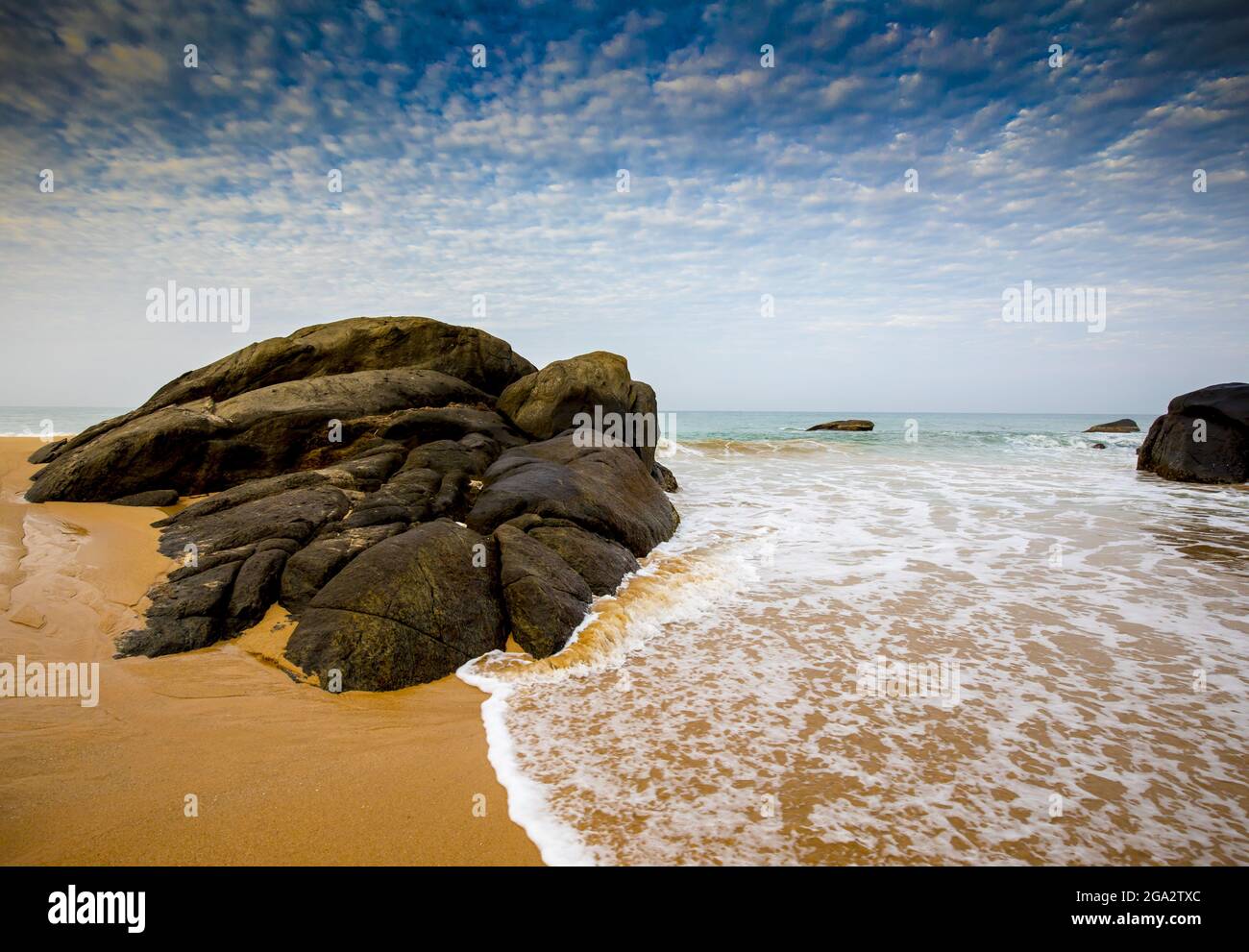 Boulders and sea surf at Kumu Beach on the Indian Ocean coast near ...