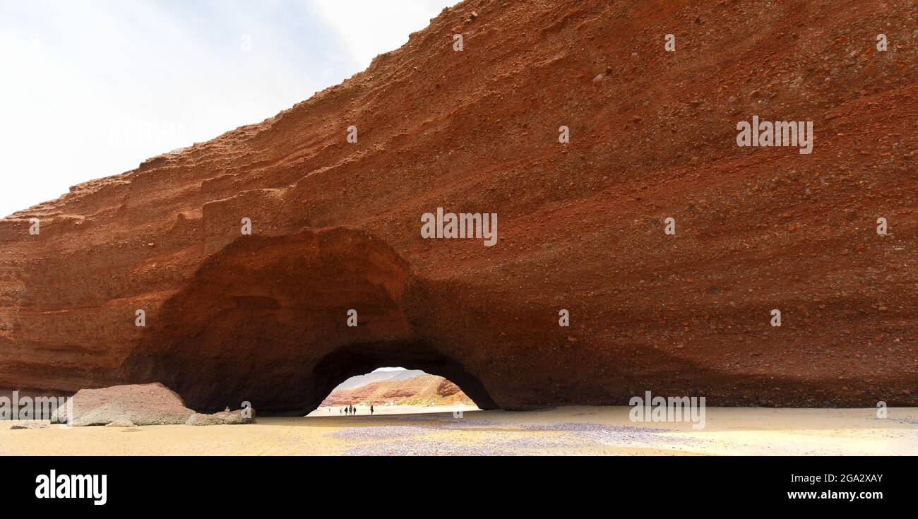Sea carved arch in sedimentary rock on Legzira Beach on the Atlantic ...
