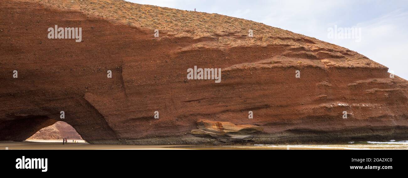 Sea carved arch in sedimentary rock on Legzira Beach on the Atlantic ...