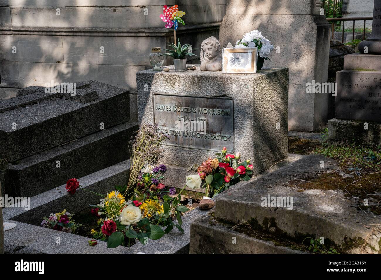 Jim Morrison's graveyard at the Pere Lachaise Cemetery which is the ...