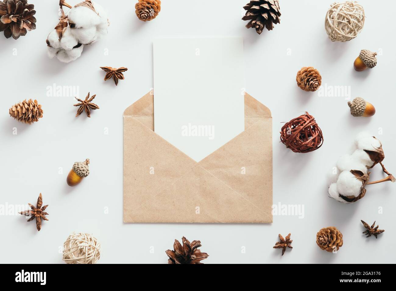 Autumn composition. Flat lay envelope with blank note mockup, cotton ...