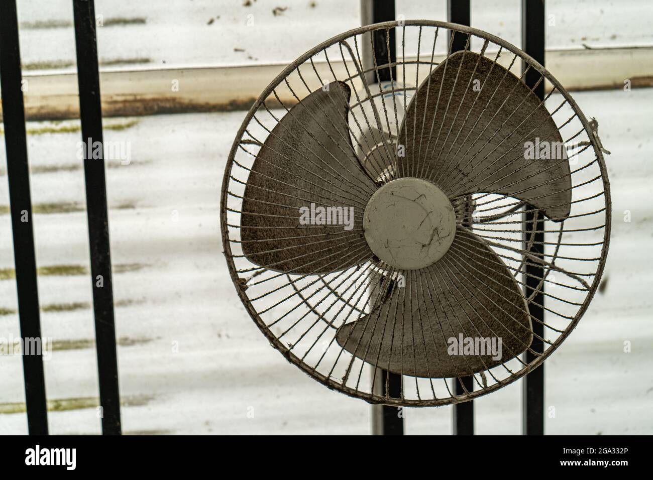 Weathered old gray fan in a home Stock Photo - Alamy
