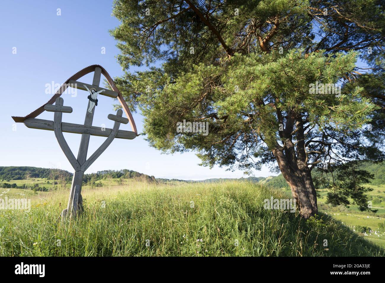 Christian cross on a hilltop in the medieval Saxon village of Copsa ...