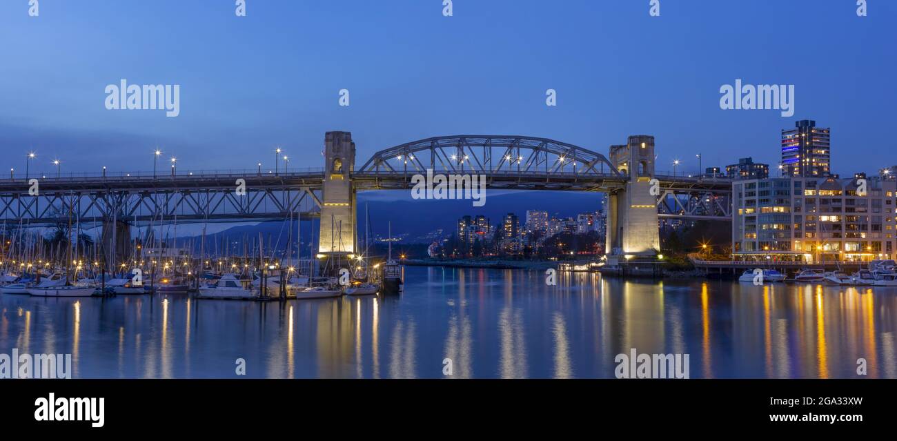 Granville Street Bridge to Granville Island at dusk; Vancouver, British ...