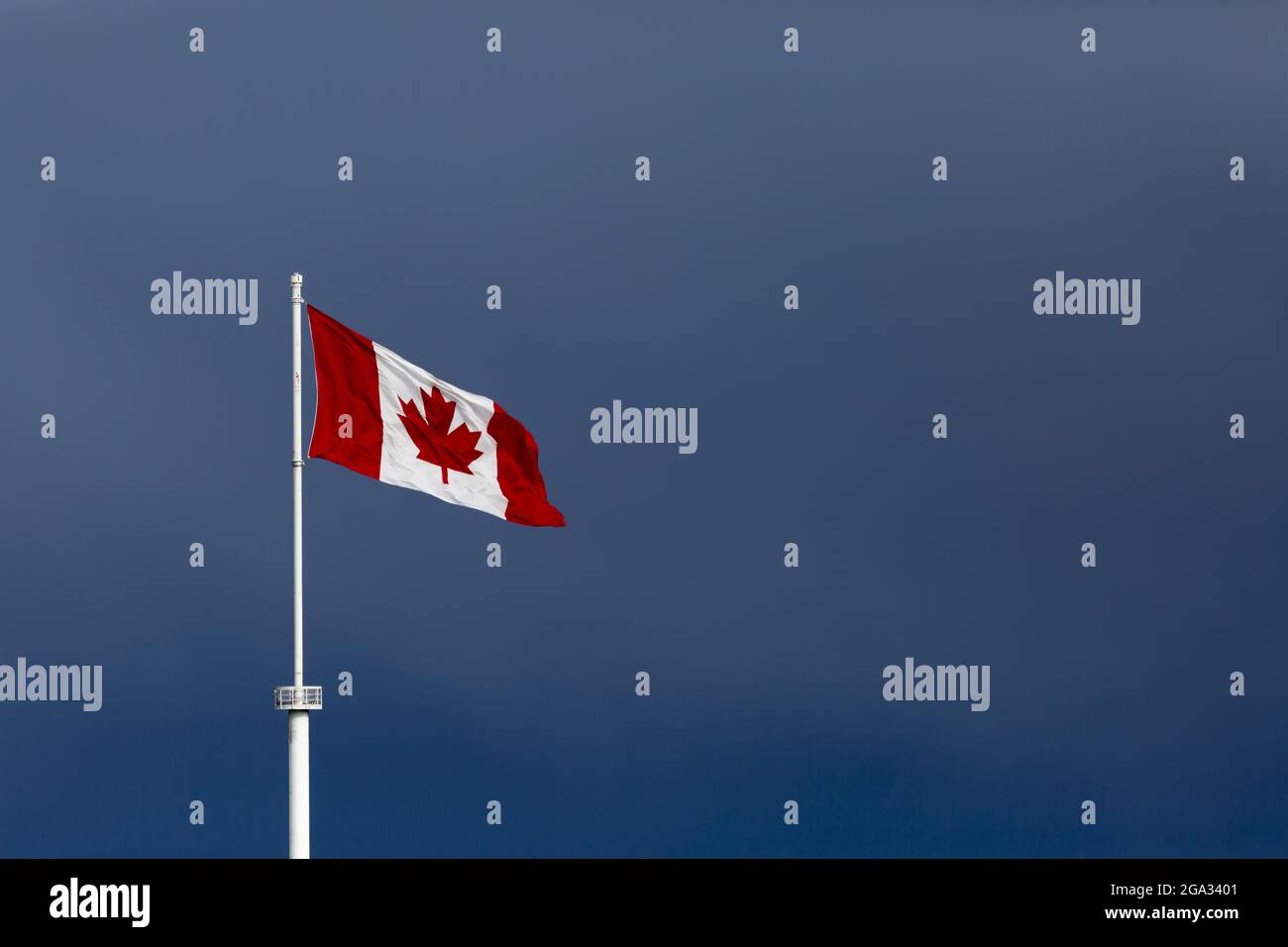 Blue sky white red flag hi-res stock photography and images - Alamy