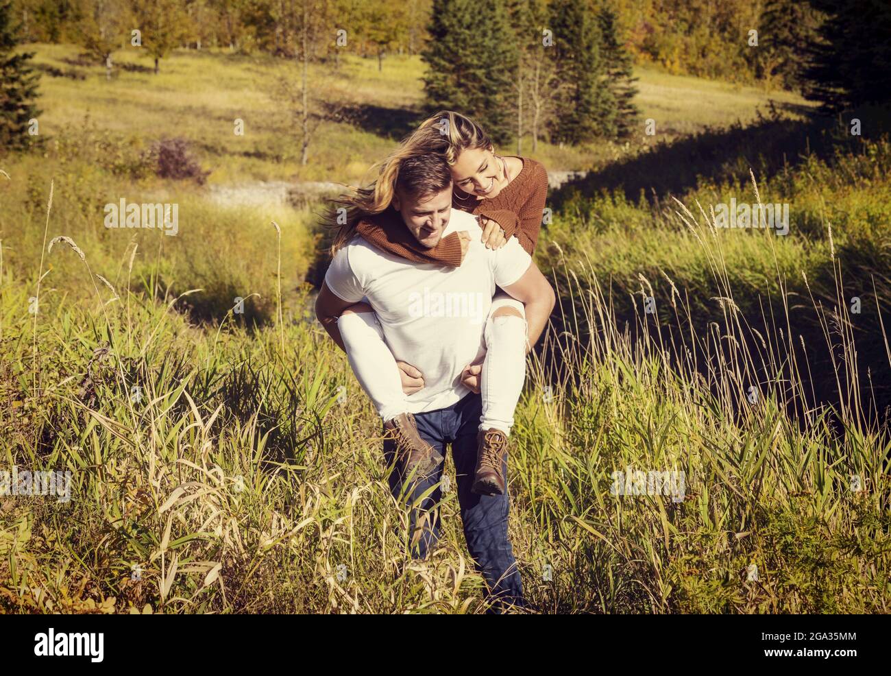 Giving piggy back ride hi-res stock photography and images - Alamy