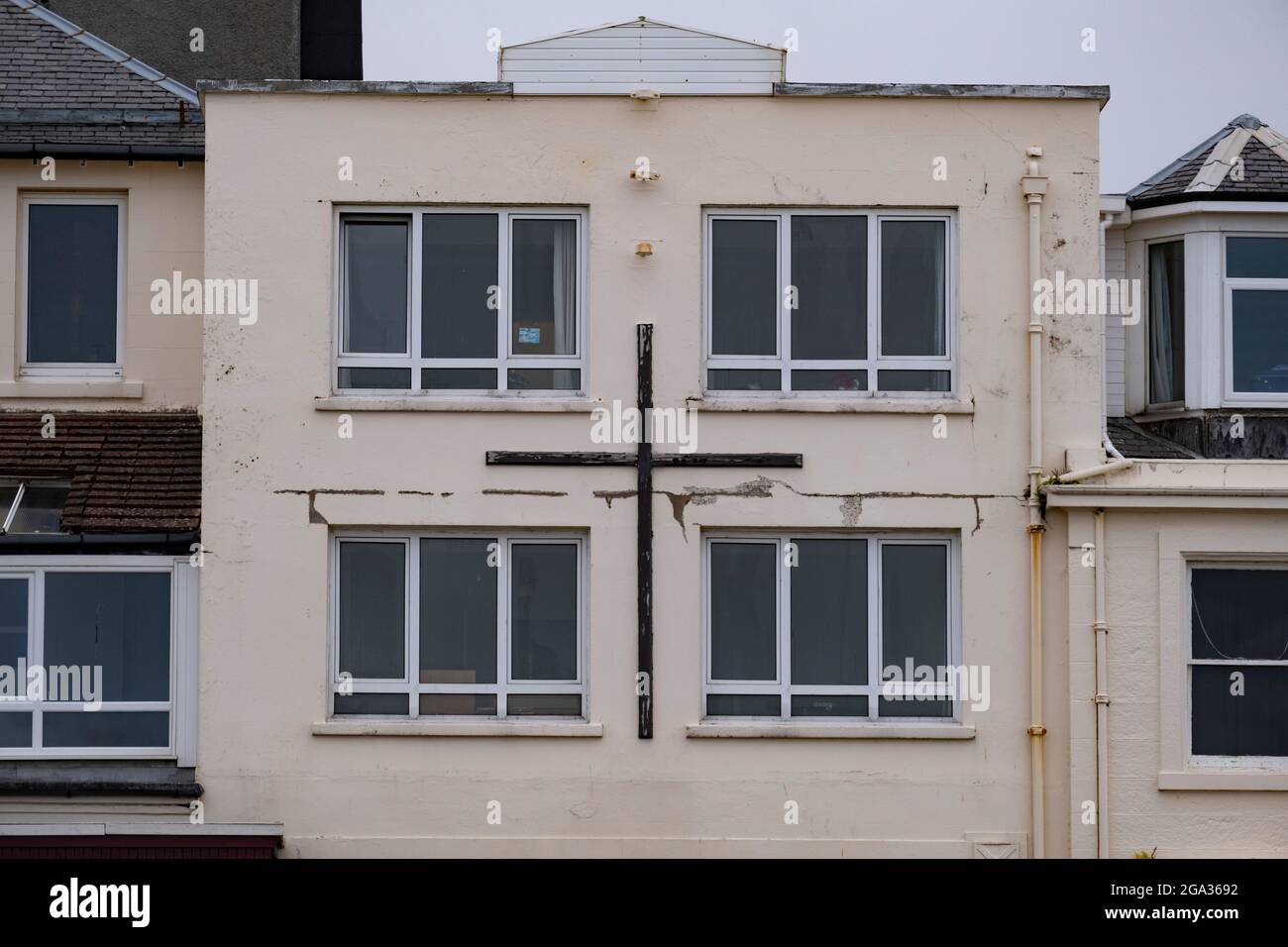 A wooden cross on the wall of a Monastery in the Scottish town of Largs ...