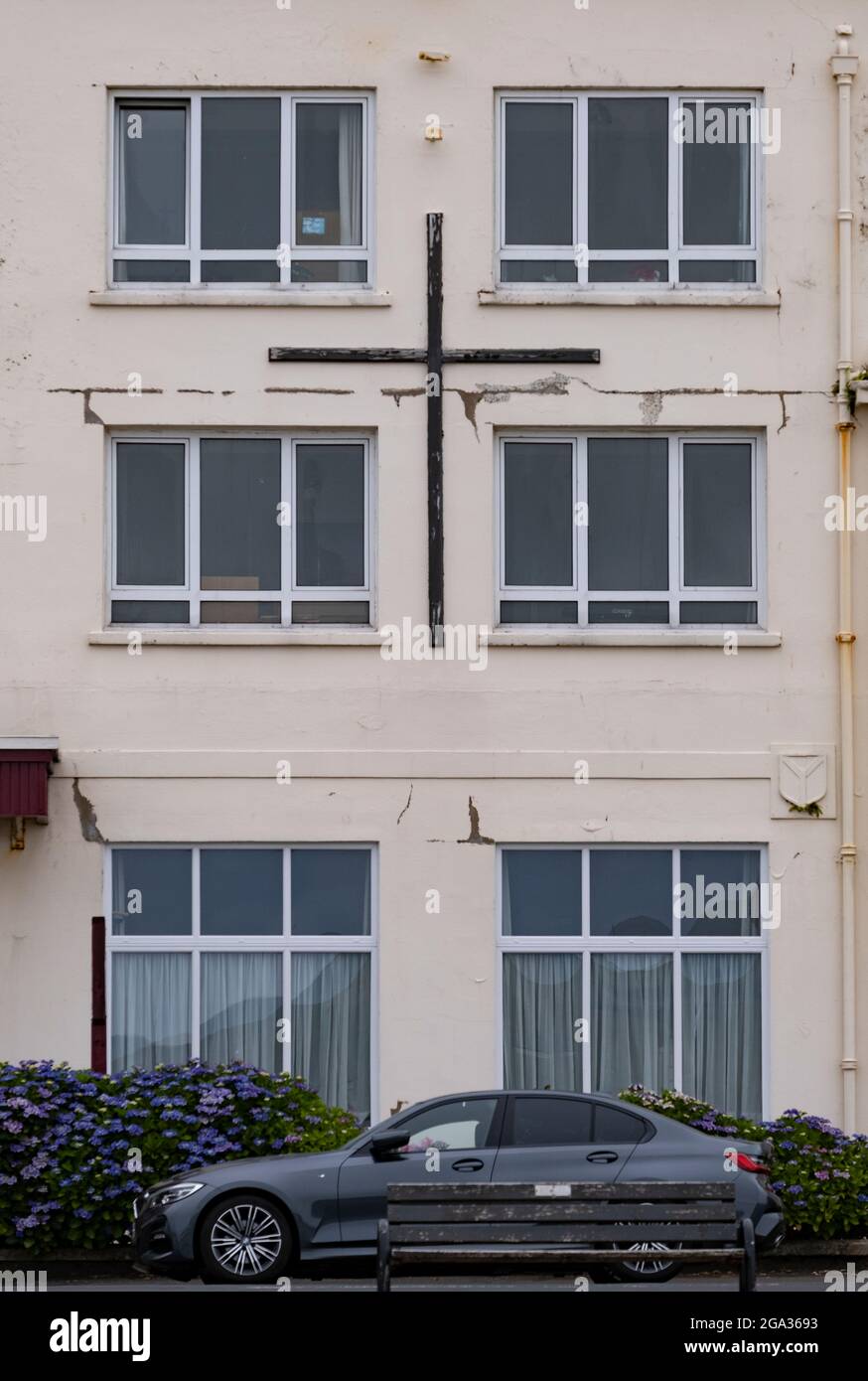 A wooden cross on the wall of a Monastery in the Scottish town of Largs ...
